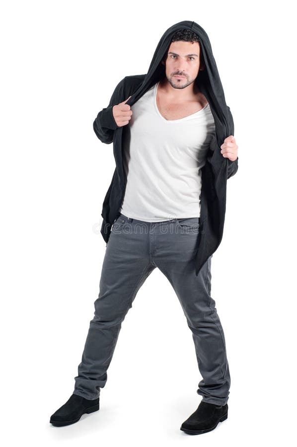 Young Man in Black Hooded Jacket Poses at Studio Stock Photo - Image of ...