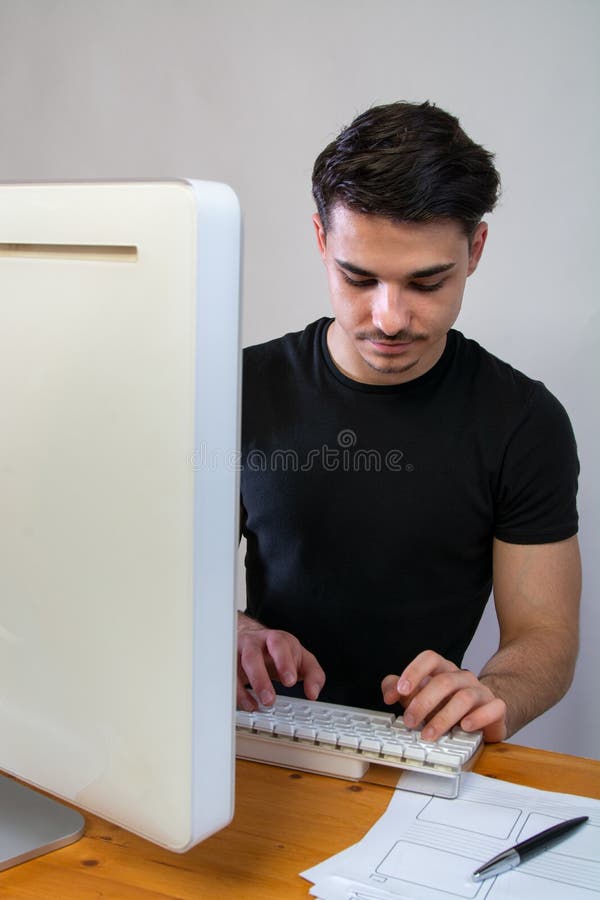 Man working on computer stock photo. Image of computer - 115536322