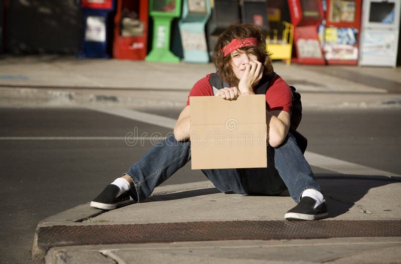 Young Man with Blank Cardboard Sign Stock Photo - Image of vest ...