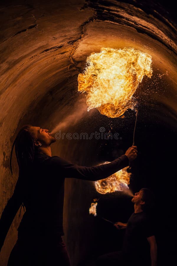 Young Man Blowing Fire from His Mouth Stock Image - Image of artist ...