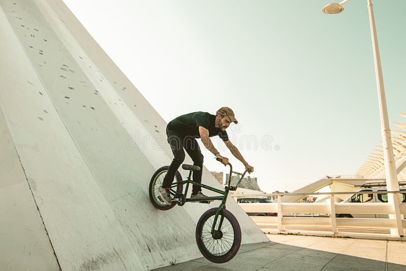 Young Man with a Bmx Bike Riding Down the Street Stock Image - Image of ...