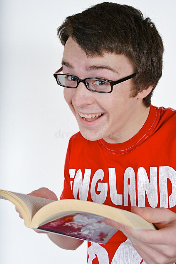 Young man with a book stock image. Image of elated, beaming - 4063173
