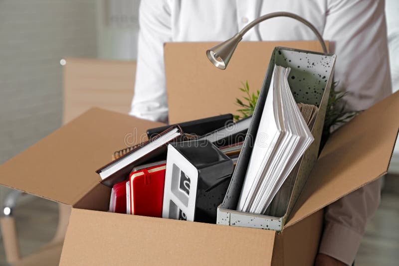 Young Man with Box of Stuff in Office Stock Image - Image of company ...