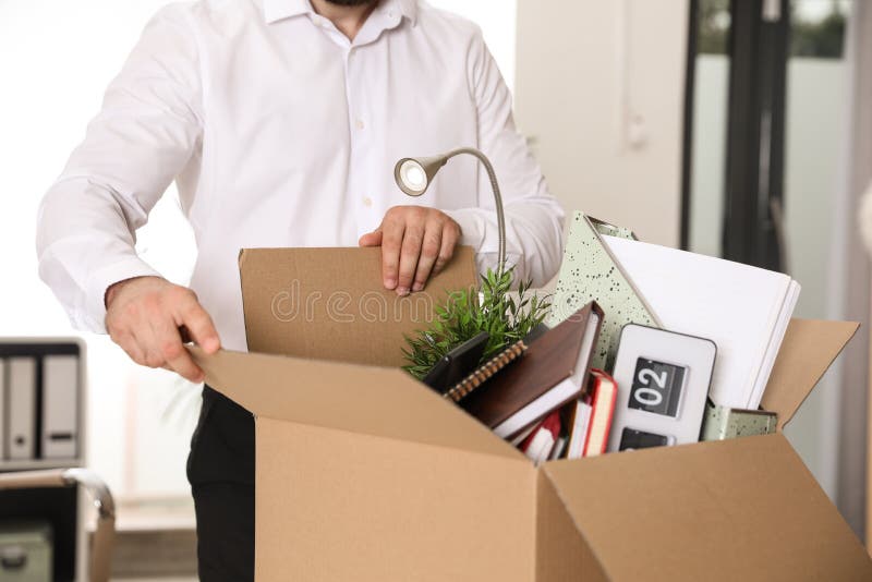 Young Man with Box of Stuff in Office Stock Image - Image of light ...