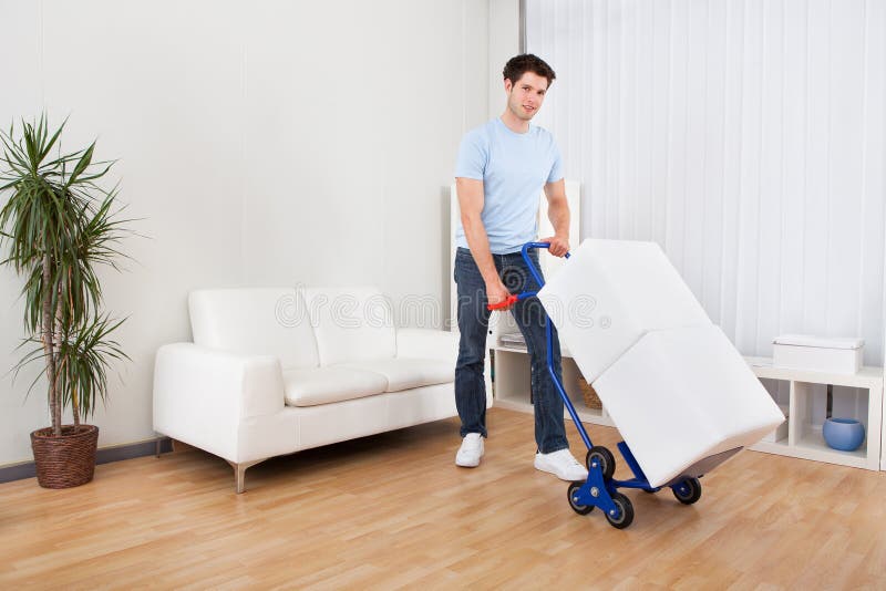 Moving Heavy Goods Trolley Stock Photos - Free & Royalty-Free Stock ...