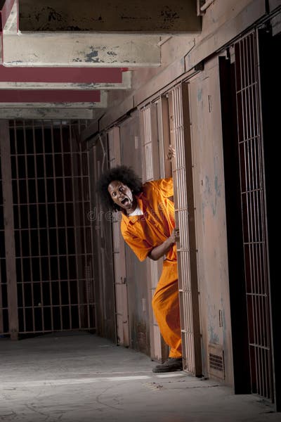 Young Man Breaking Out of Prison Stock Photo - Image of hair, full ...