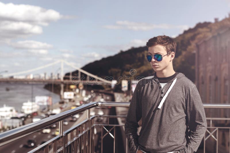 Young Man on a Bridge in a Big City Stock Photo - Image of modern ...