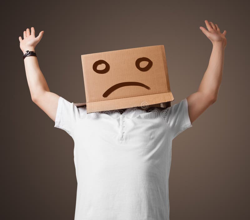 Young Man with a Brown Cardboard Box on His Head with Sad Face Stock ...