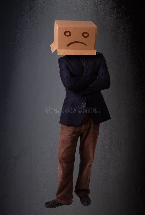Young Man with a Brown Cardboard Box on His Head with Sad Face Stock ...