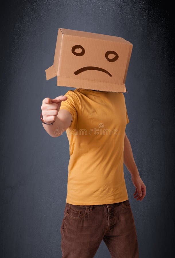 Young Man with a Brown Cardboard Box on His Head with Sad Face Stock ...