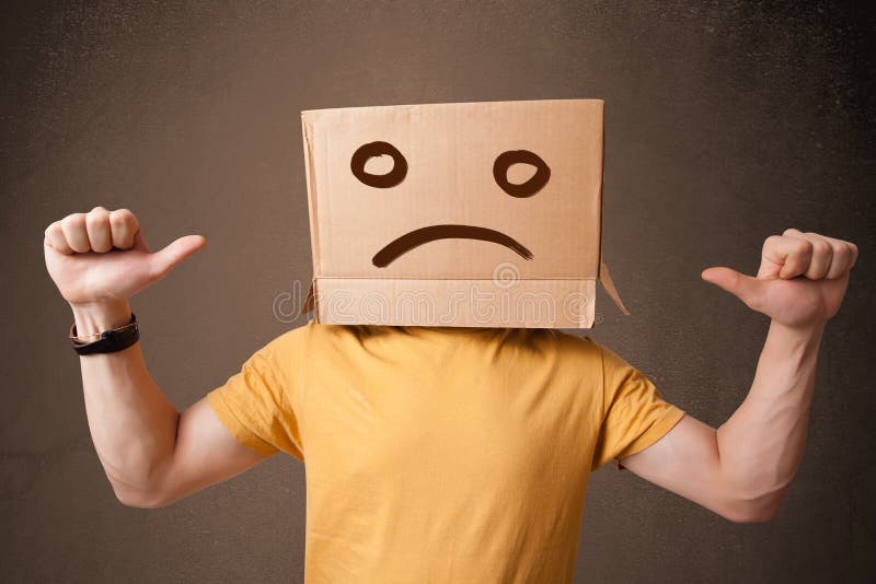 Young Man with a Brown Cardboard Box on His Head with Sad Face Stock ...