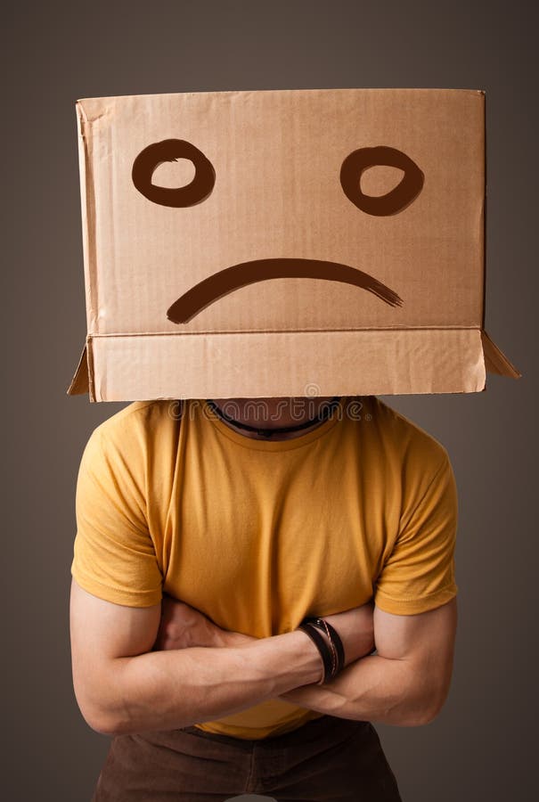 Young Man with a Brown Cardboard Box on His Head with Sad Face Stock ...