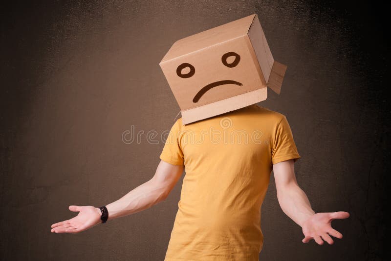 Young Man with a Brown Cardboard Box on His Head with Sad Face Stock ...