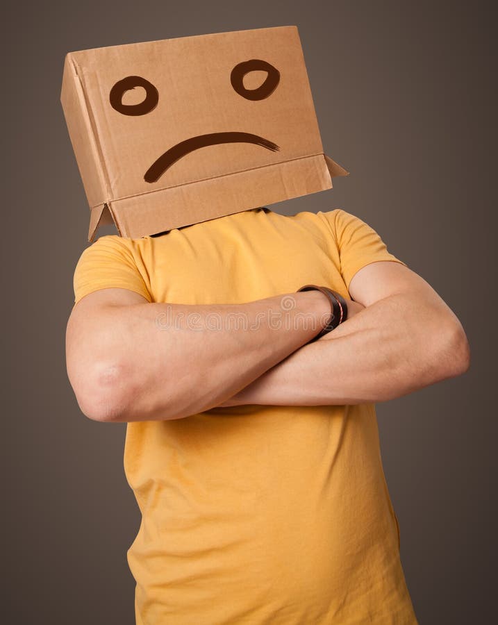 Young Man with a Brown Cardboard Box on His Head with Sad Face Stock ...