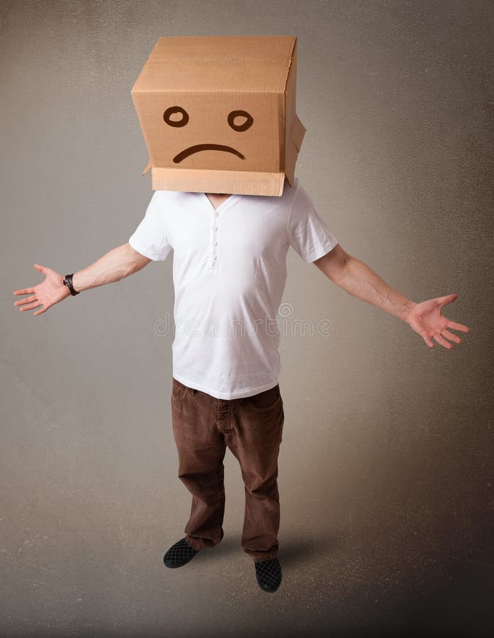 Young Man with a Brown Cardboard Box on His Head with Sad Face Stock ...
