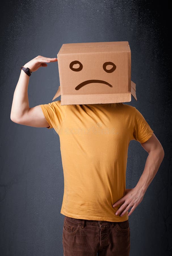 Young Man with a Brown Cardboard Box on His Head with Sad Face Stock ...