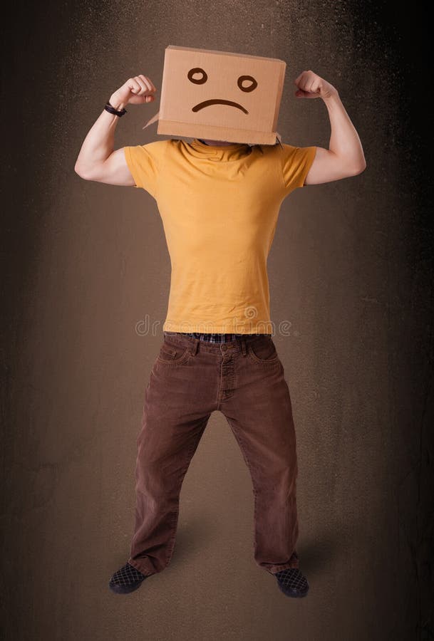 Young Man with a Brown Cardboard Box on His Head with Sad Face Stock ...