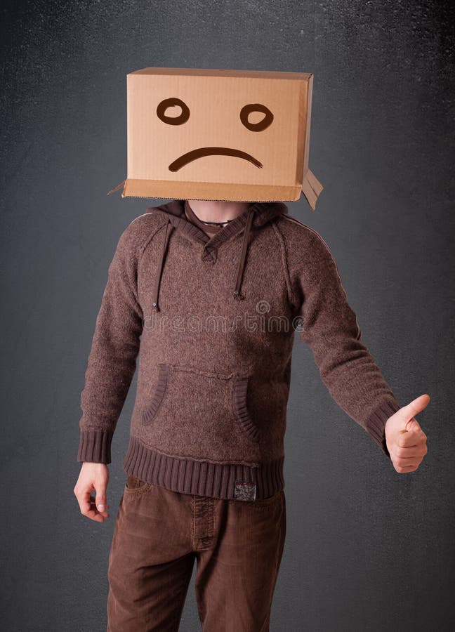 Young Man with a Brown Cardboard Box on His Head with Sad Face Stock ...