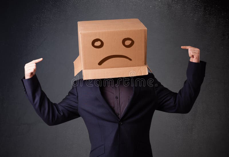 Young Man with a Brown Cardboard Box on His Head with Sad Face Stock ...