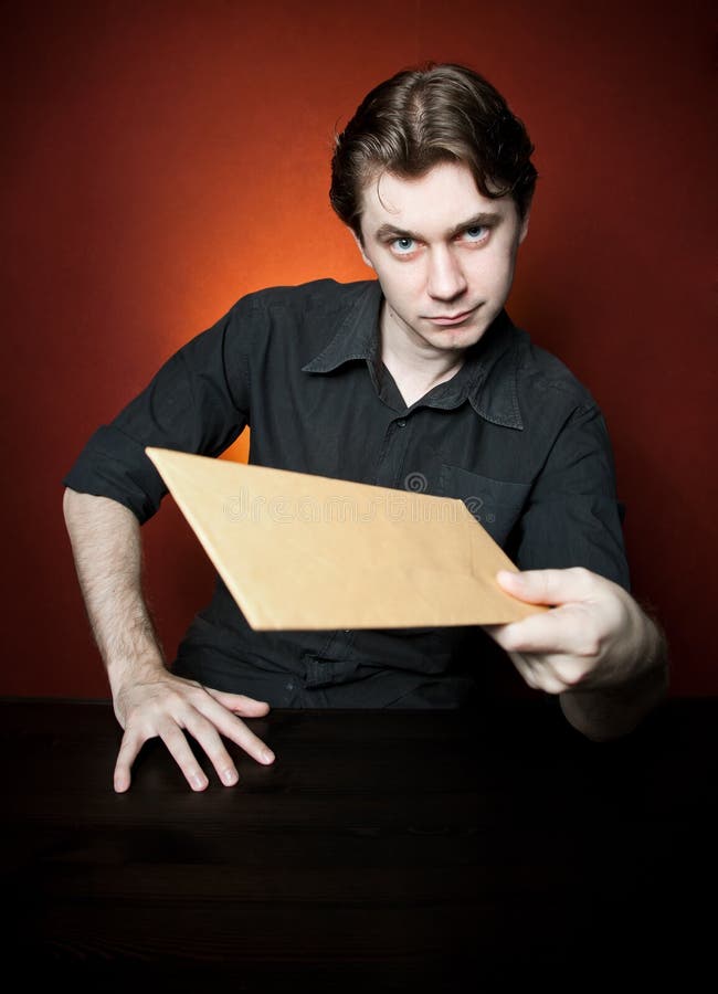 Young Man with Brown Envelope. Stock Image - Image of contacting ...