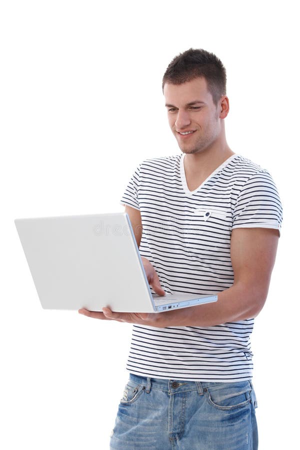 Young Man Browsing Internet Smiling Stock Image - Image of look ...