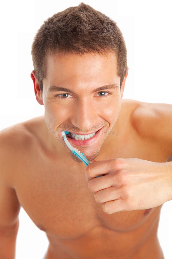 Young Man Brushing His Teeth Stock Photo - Image of young, male: 29516826
