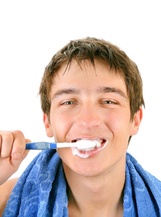Young Man Brushing His Teeth Stock Photo - Image of dental, hold: 236959328