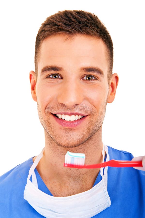 A Young Man Brushing His Teeth Isolated on White Background Stock Photo ...