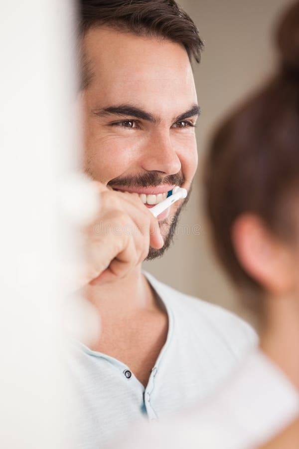 Young Man Brushing His Teeth Stock Image - Image of domicile, dental ...