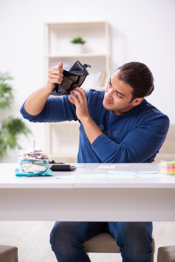 Young Man in Budget Planning Concept Stock Photo - Image of calculating ...