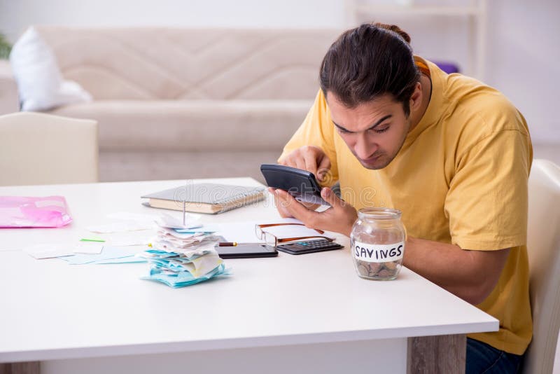 Young Man in Budget Planning Concept Stock Photo - Image of counting ...