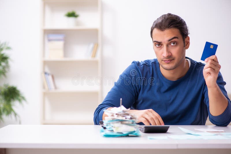Young Man in Budget Planning Concept Stock Photo - Image of expense ...
