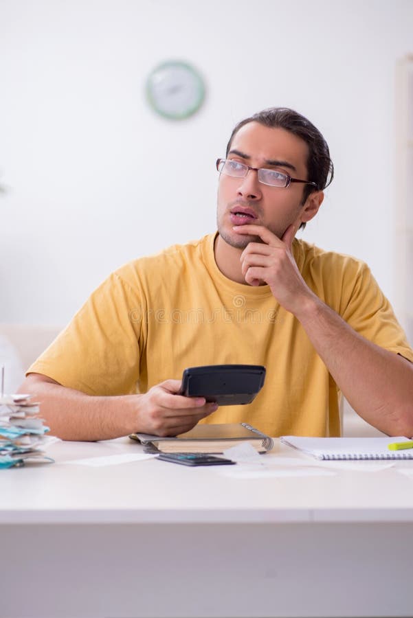 Young Man in Budget Planning Concept Stock Image - Image of expenses ...