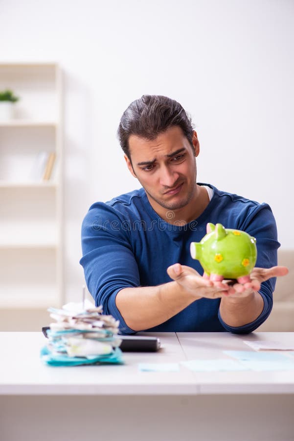 Young Man in Budget Planning Concept Stock Photo - Image of insolvency ...