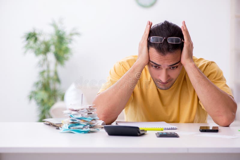 Young Man in Budget Planning Concept Stock Image - Image of broke, bank ...
