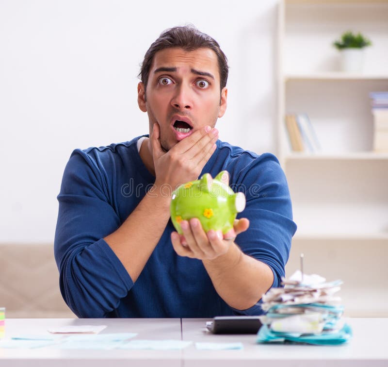 Young Man in Budget Planning Concept Stock Photo - Image of covid19 ...