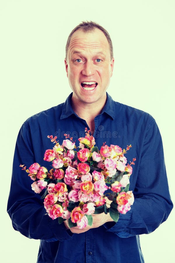 Man with Bunch of Flowers in Front of White Background Stock Image ...