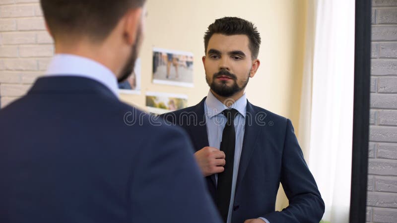 Young Man in Business Suit Getting Ready for Work Interview in Front of ...
