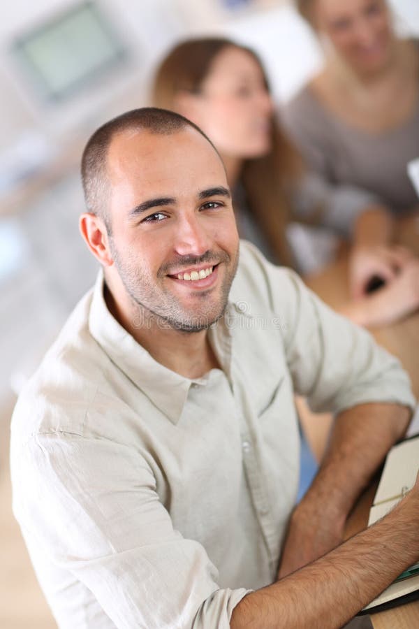 Young Man in Business Training Stock Photo - Image of smiling, group ...
