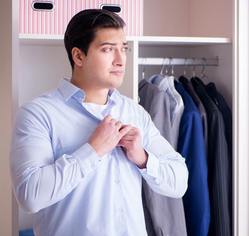 Young Man Businessman Getting Dressed for Work Stock Photo - Image of ...