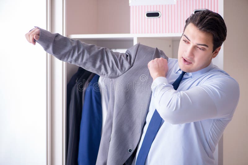 The Young Man Businessman Getting Dressed for Work Stock Photo - Image ...