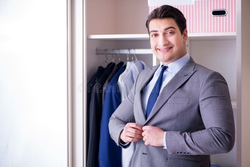 The Young Man Businessman Getting Dressed for Work Stock Photo - Image ...