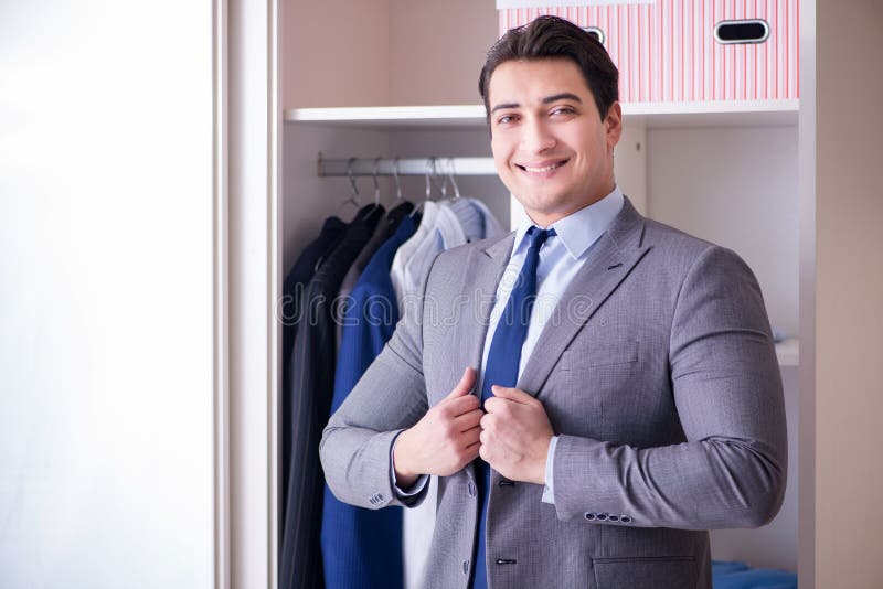 The Young Man Businessman Getting Dressed for Work Stock Image - Image ...
