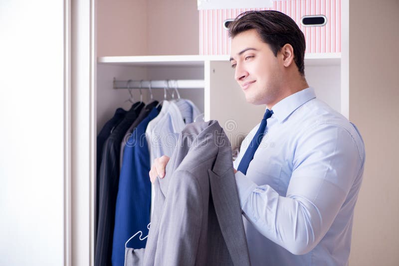 The Young Man Businessman Getting Dressed for Work Stock Image - Image ...