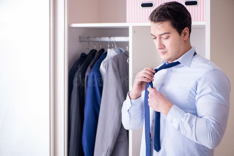 The Young Man Businessman Getting Dressed for Work Stock Photo - Image ...