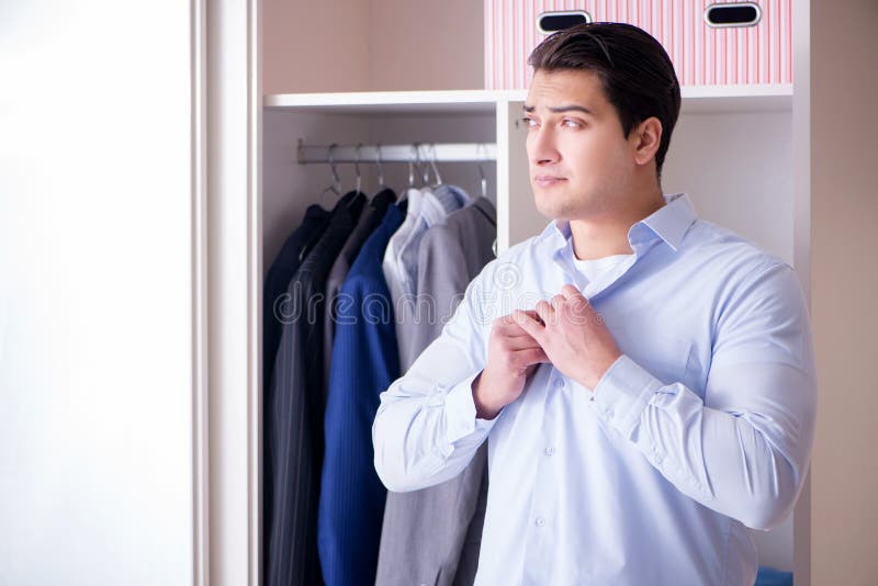 The Young Man Businessman Getting Dressed for Work Stock Image - Image ...