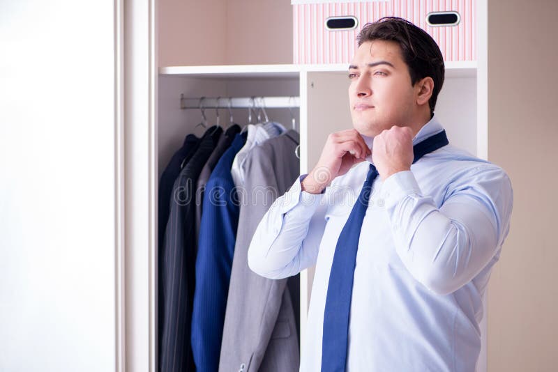 The Young Man Businessman Getting Dressed for Work Stock Image - Image ...