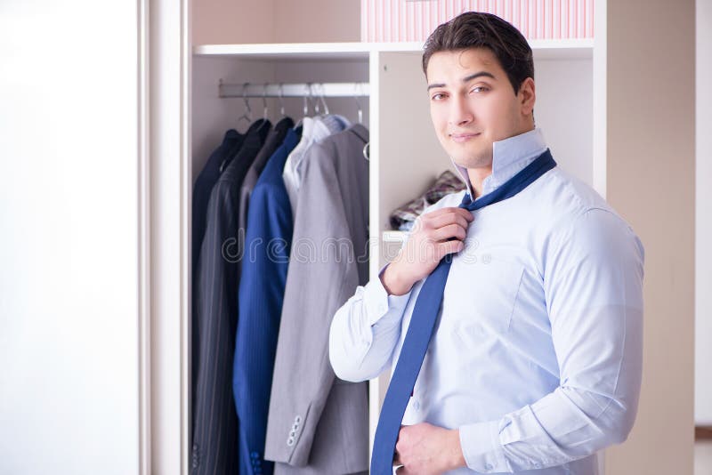 The Young Man Businessman Getting Dressed for Work Stock Photo - Image ...