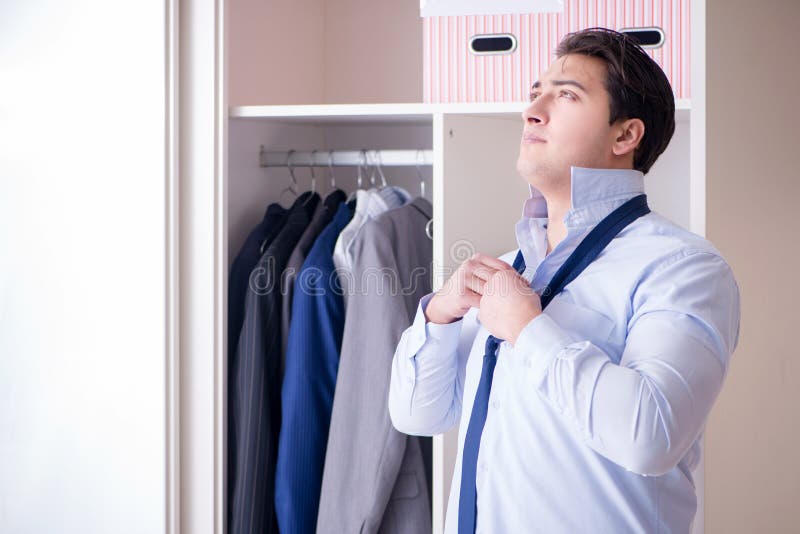 The Young Man Businessman Getting Dressed for Work Stock Image - Image ...