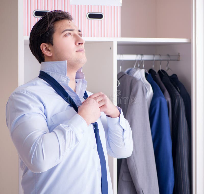 Young Man Businessman Getting Dressed for Work Stock Photo - Image of ...